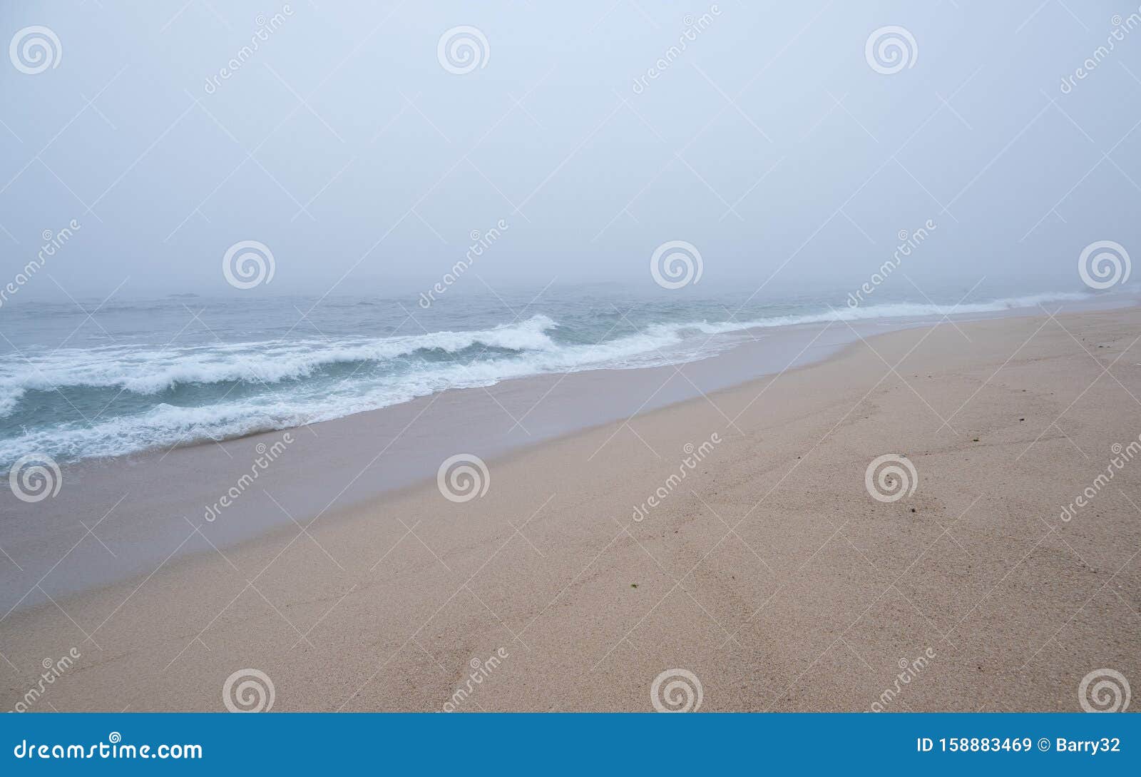 Thick, Dense Fog Over the Ocean As Waves Break on the Empty Beach ...