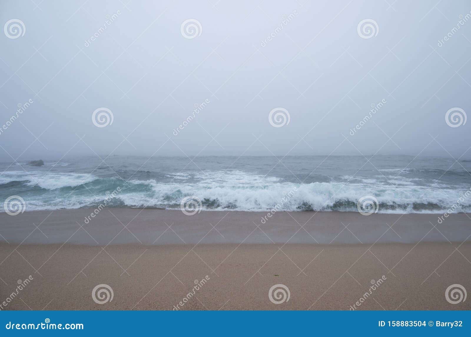 Thick, Dense Fog Over the Ocean. Waves Breaking on the Sandy Shore ...