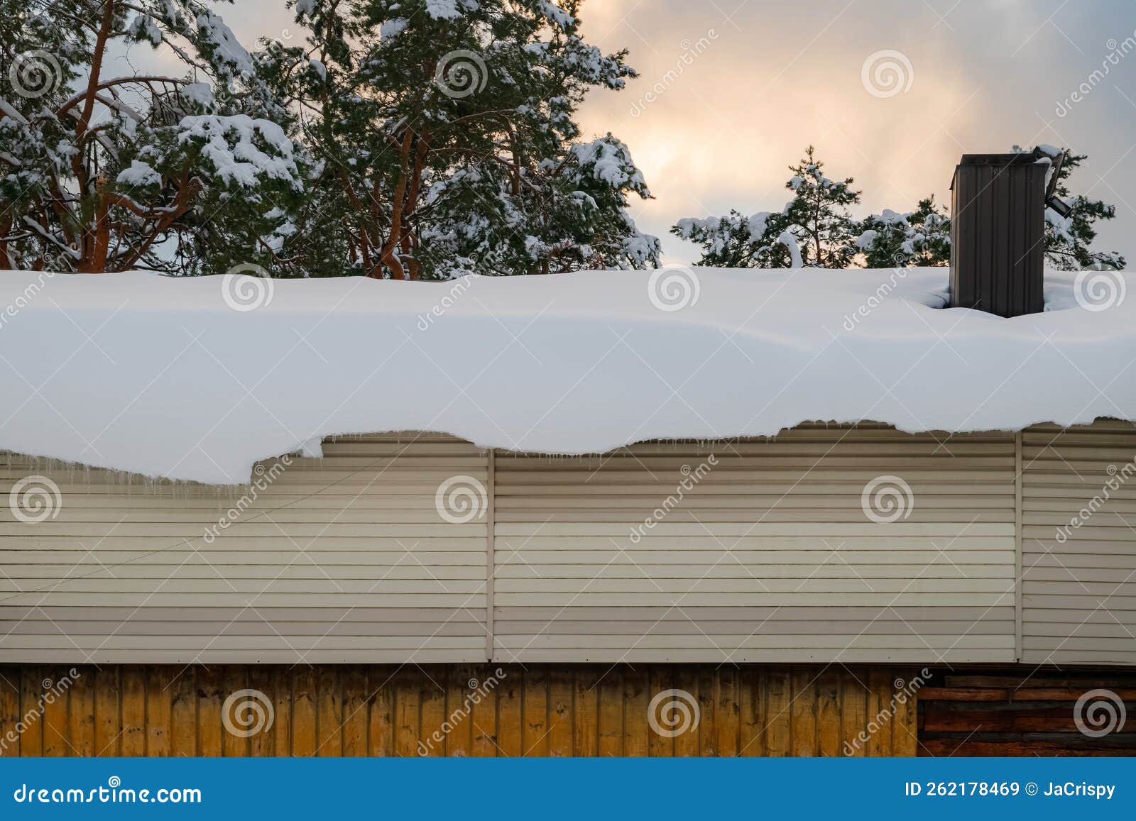 Thick Layer of Snow Hanging Off the Edge of the Roof Stock Image ...