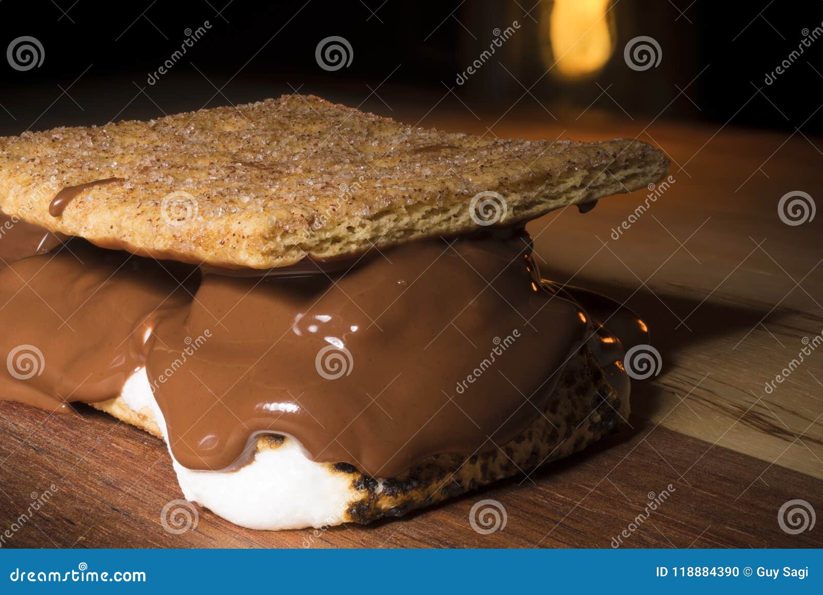Thick smore while camping stock photo. Image of wood - 118884390