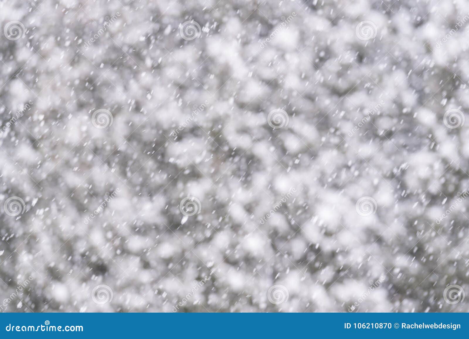 Thick Snow Falling In Front Of Soft Defocused Trees In Background ...
