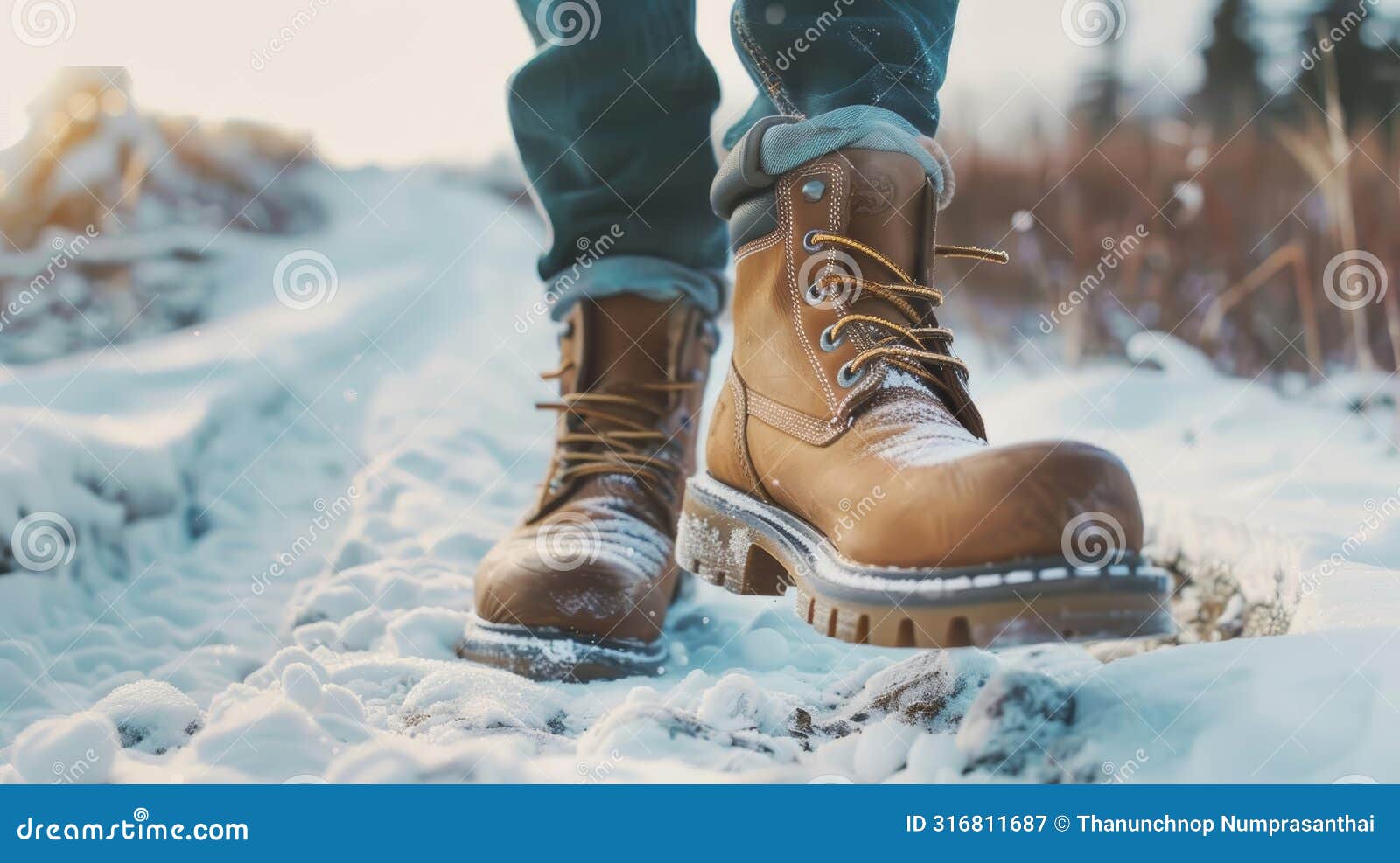 Thicksoled, Leather Work Boots Stepping Over Rugged Terrain Stock ...