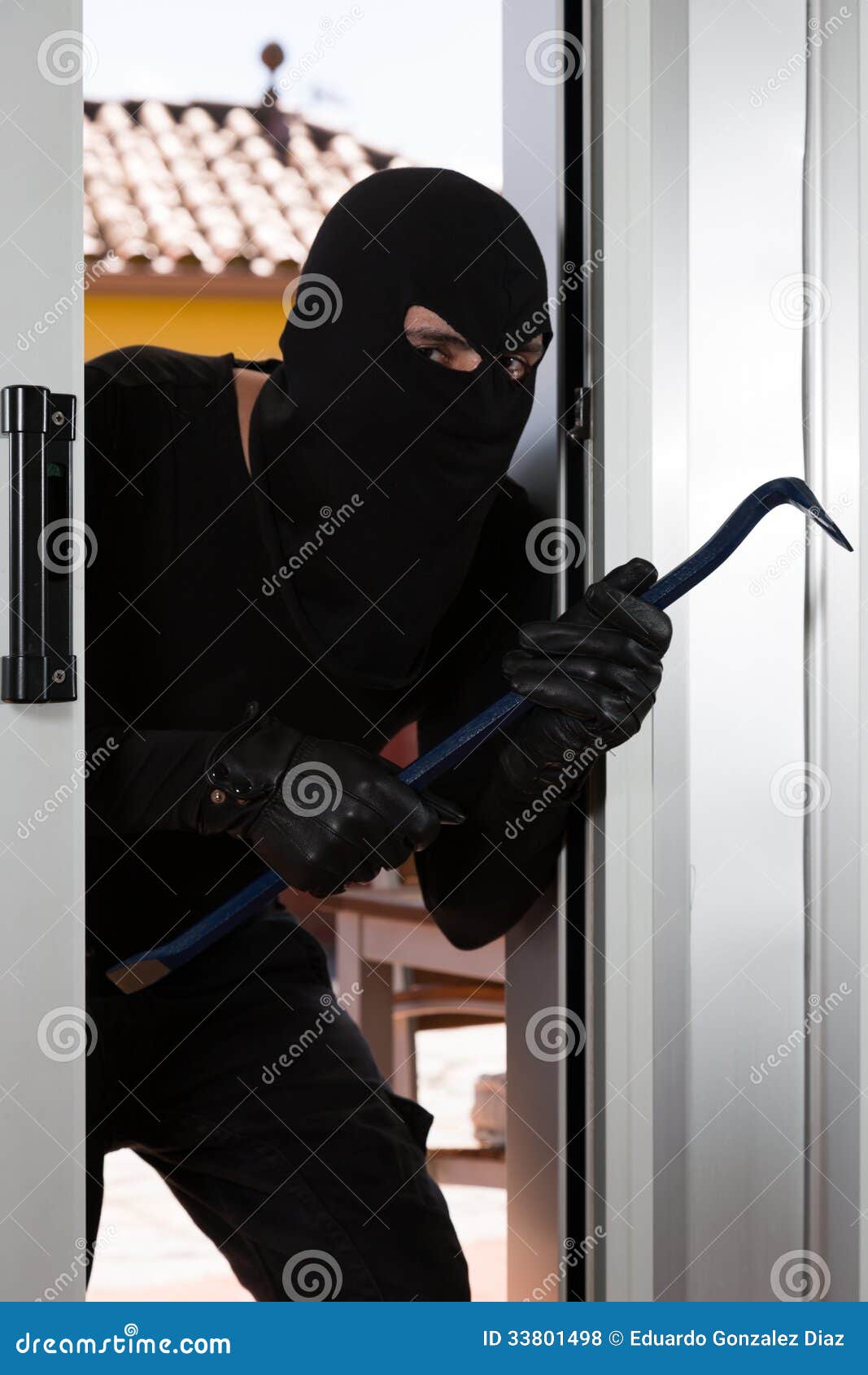 Thief with a bar of iron stock photo. Image of crowbar - 33801498