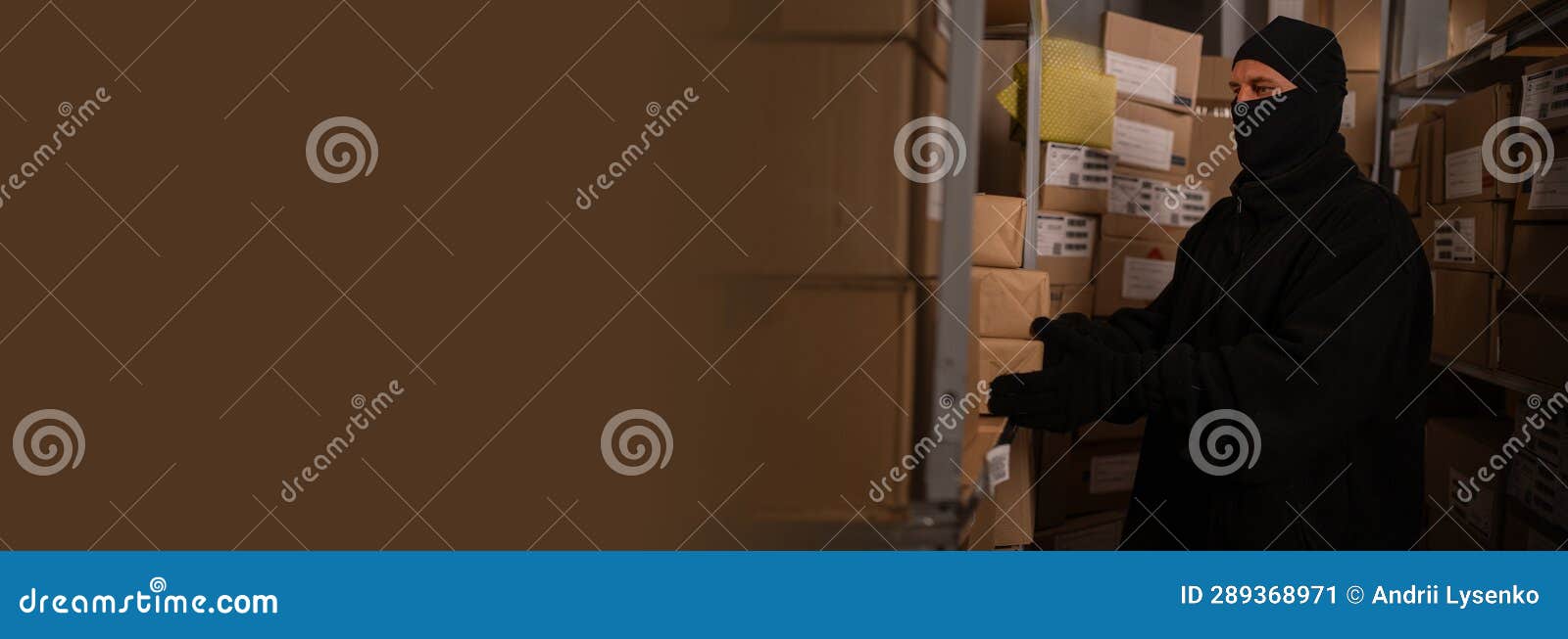 Thief in Black Gloves Take a Boxes of Goods in a Warehouse at Night ...