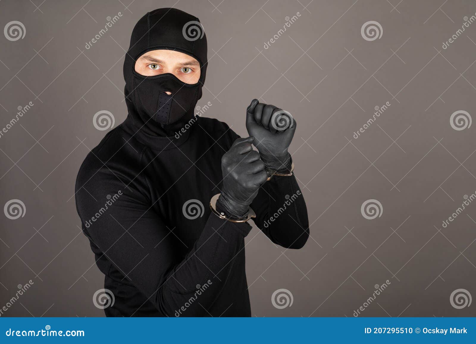 Thief in black suit stock photo. Image of crime, gangster - 207295510