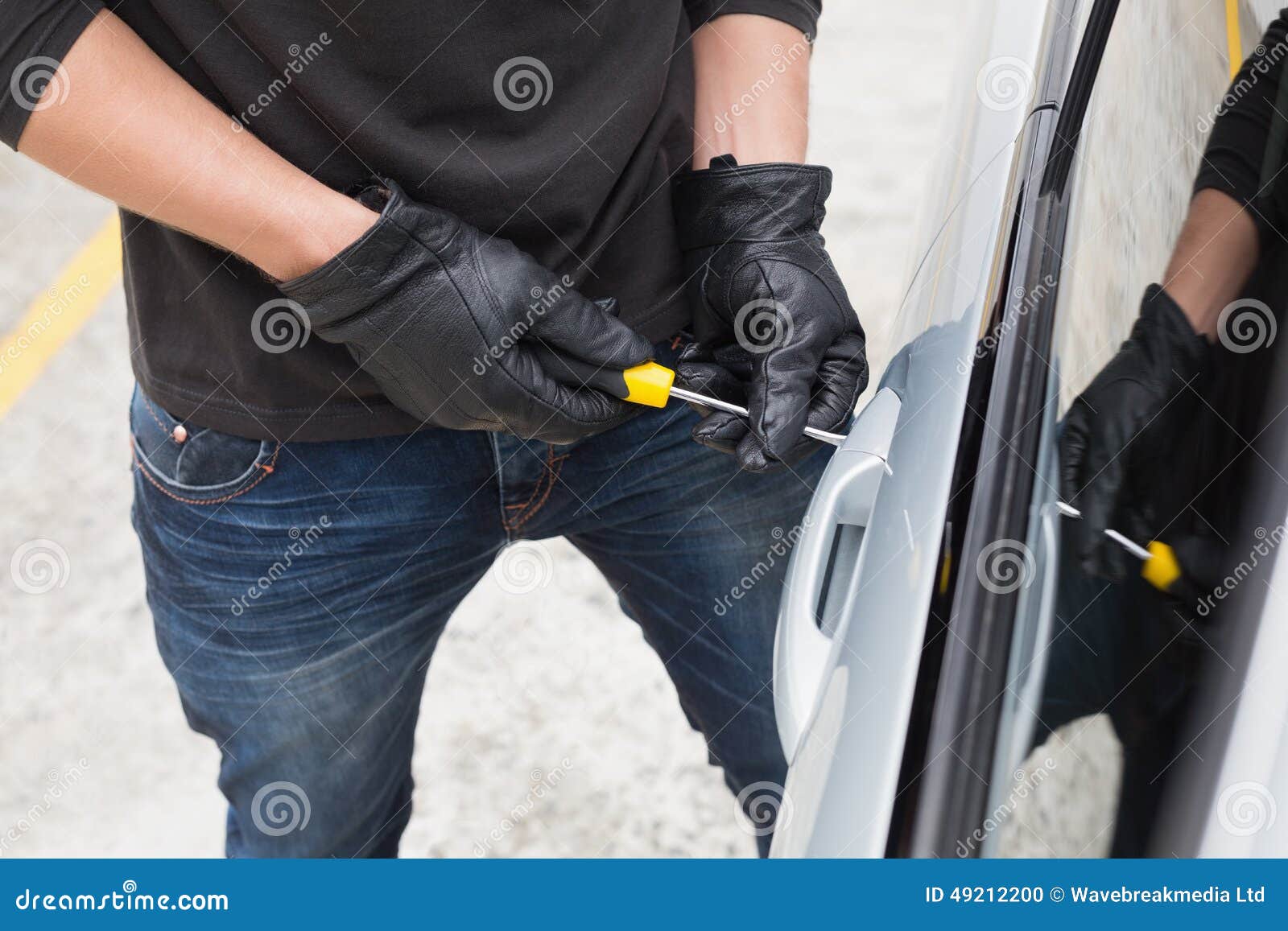 Thief Breaking Lock To Open The Gate. Male Thief Trying To Open Gate ...