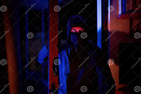 The Thief Looks through the Glass Stock Photo - Image of mugger ...