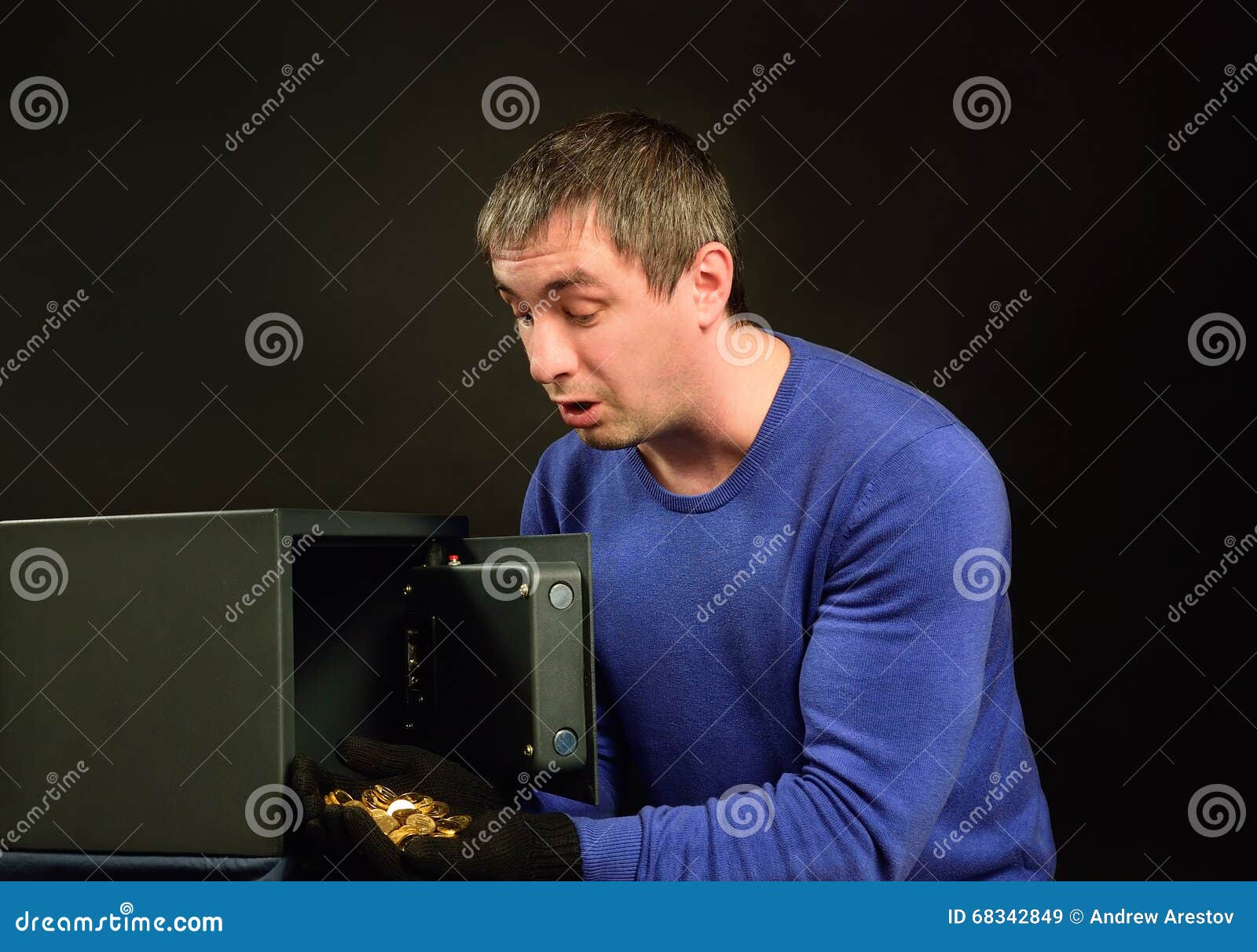 The Thief Breaks the Safe with a Combination Lock Stock Image - Image ...