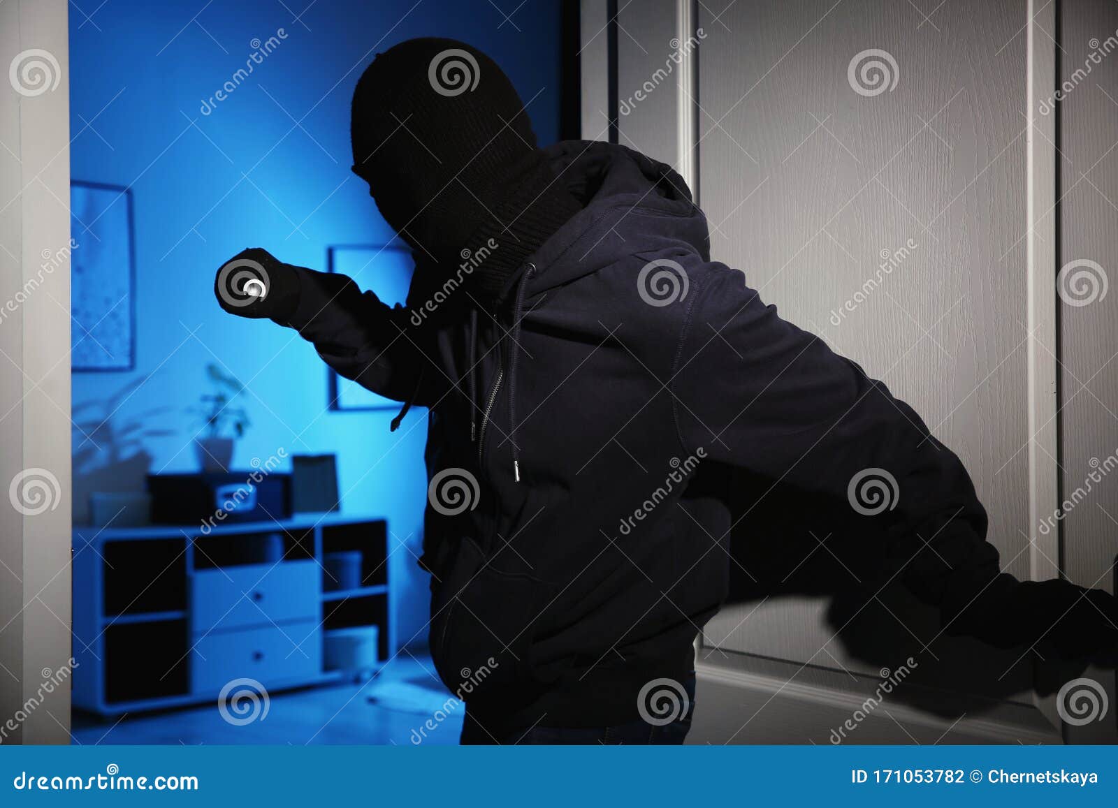 Thief With Flashlight And Crowbar Entering House Royalty-Free Stock ...