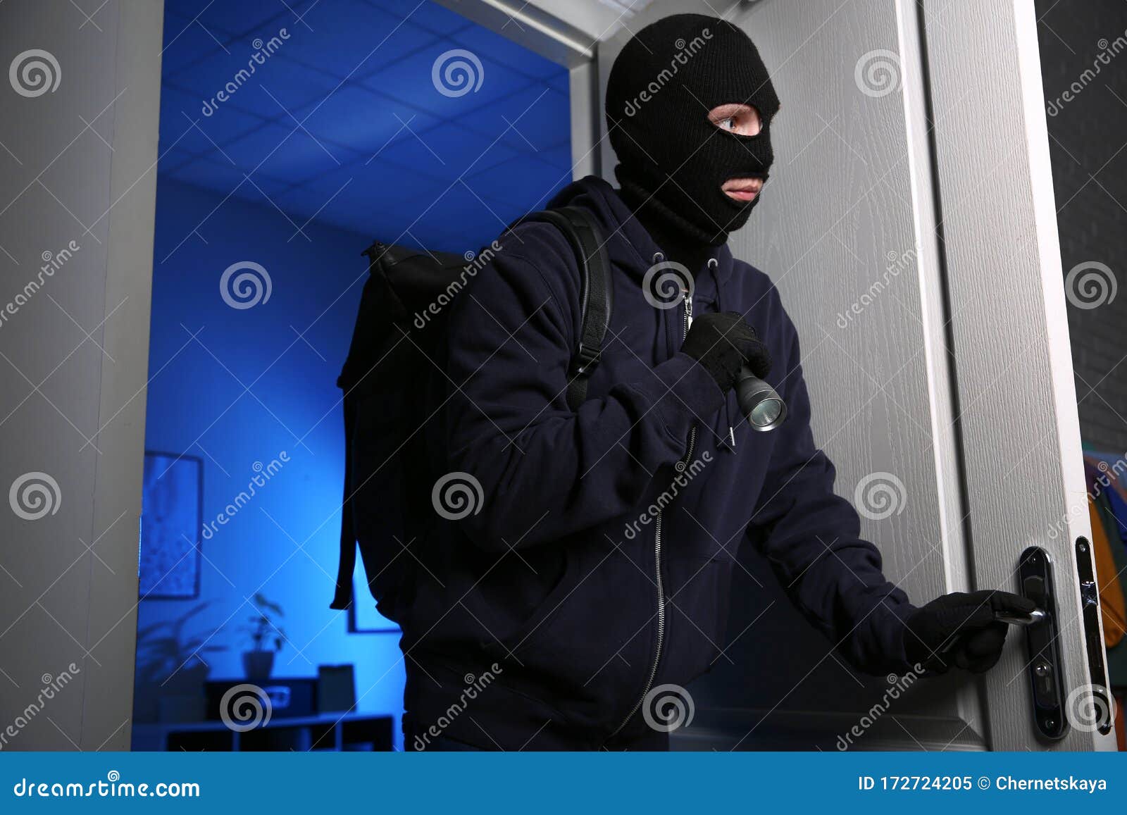 Thief With Flashlight And Crowbar Entering House Royalty-Free Stock ...
