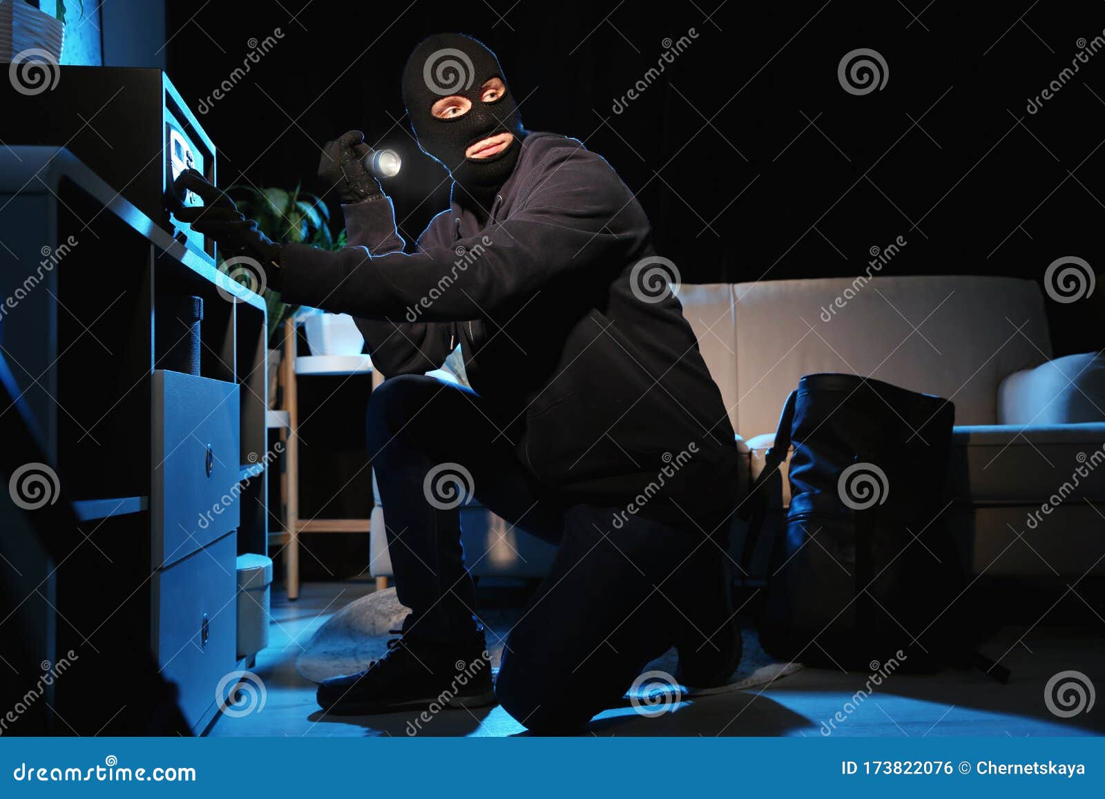 Thief with Flashlight Near Steel Safe Indoors Stock Photo - Image of ...