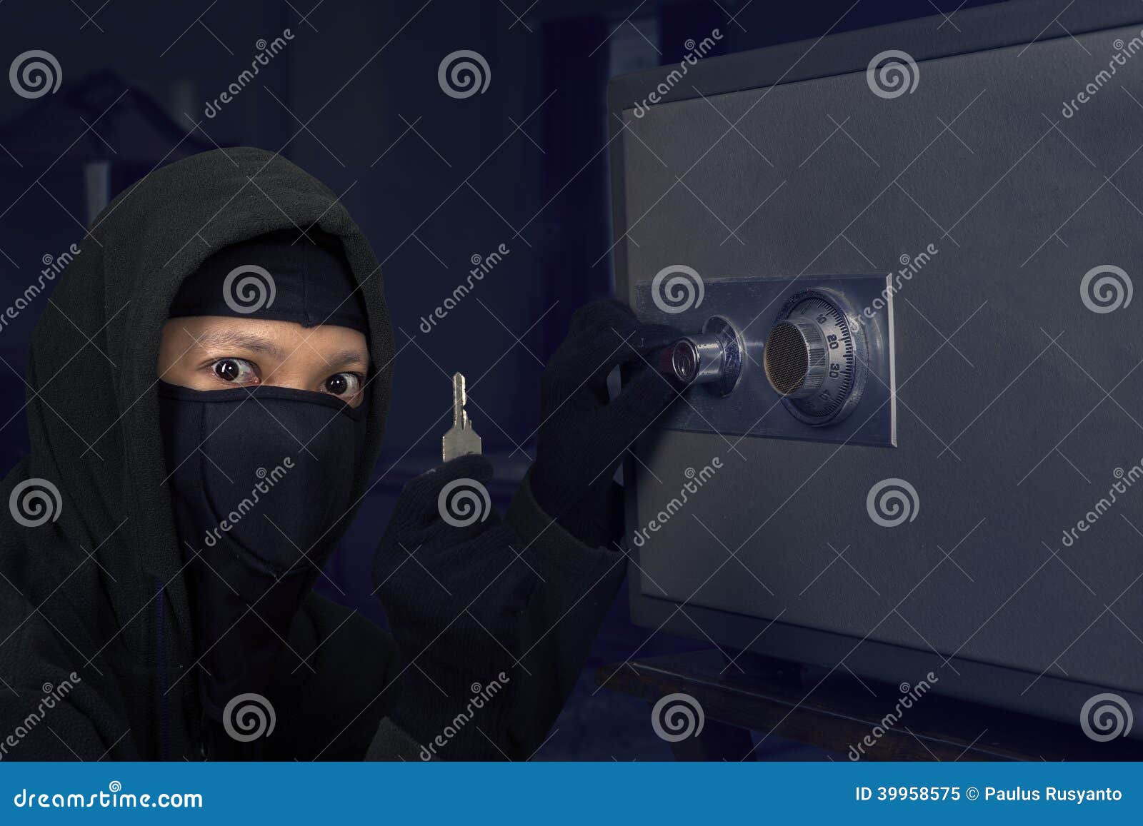 A thief getting the key 1 stock image. Image of business - 39958575