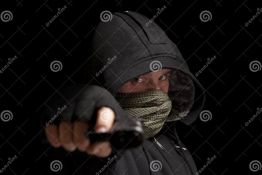 Thief with gun stock photo. Image of burglar, handgun - 17402554
