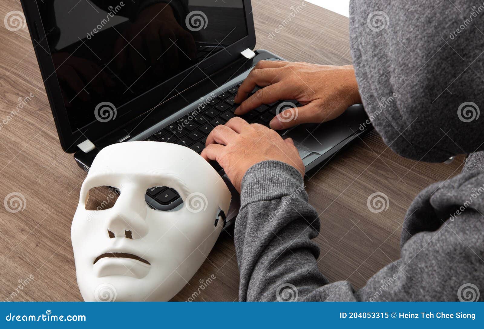 Thief Hacker in Mask Stealing Personal Information from Laptop Stock ...
