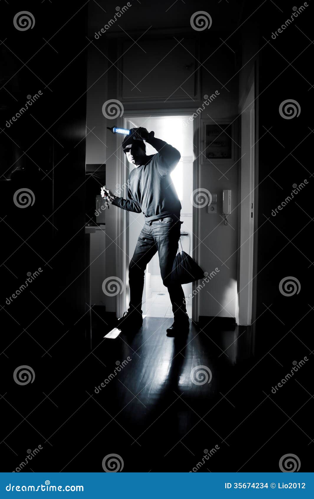Thief in a house stock photo. Image of inside, lamp, dark - 35674234