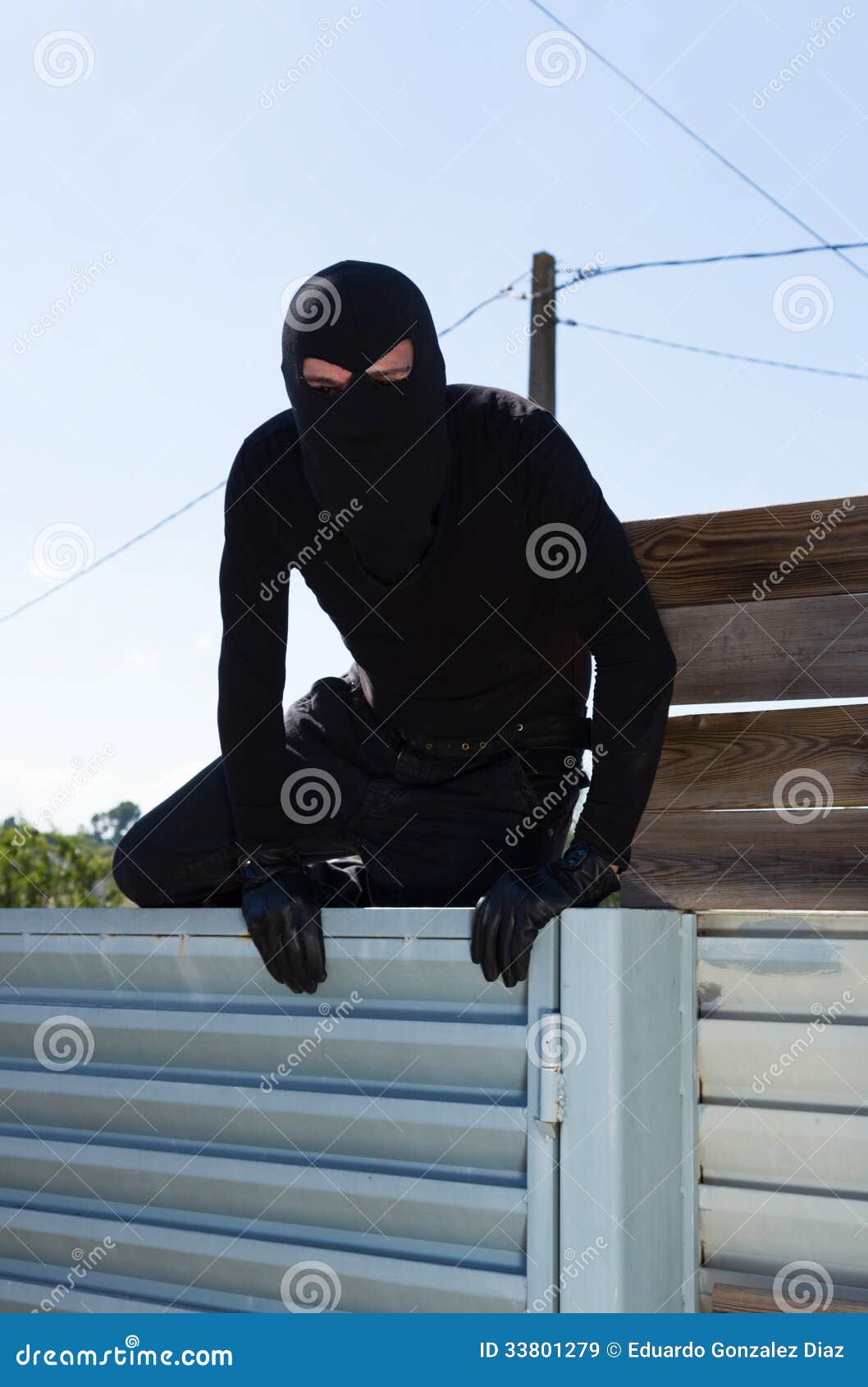 Thief jumping a fence stock image. Image of fence, assault - 33801279