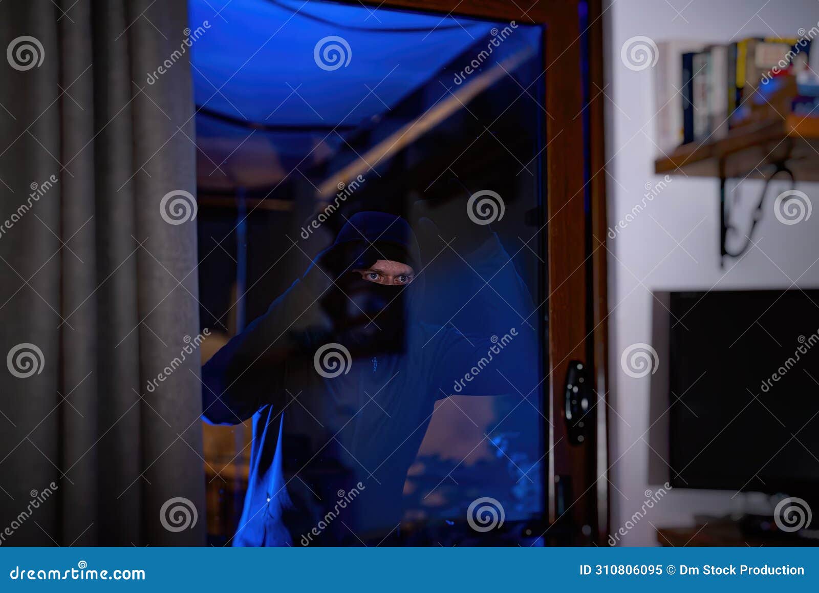 The Thief Looks through the Glass Stock Image - Image of glass ...