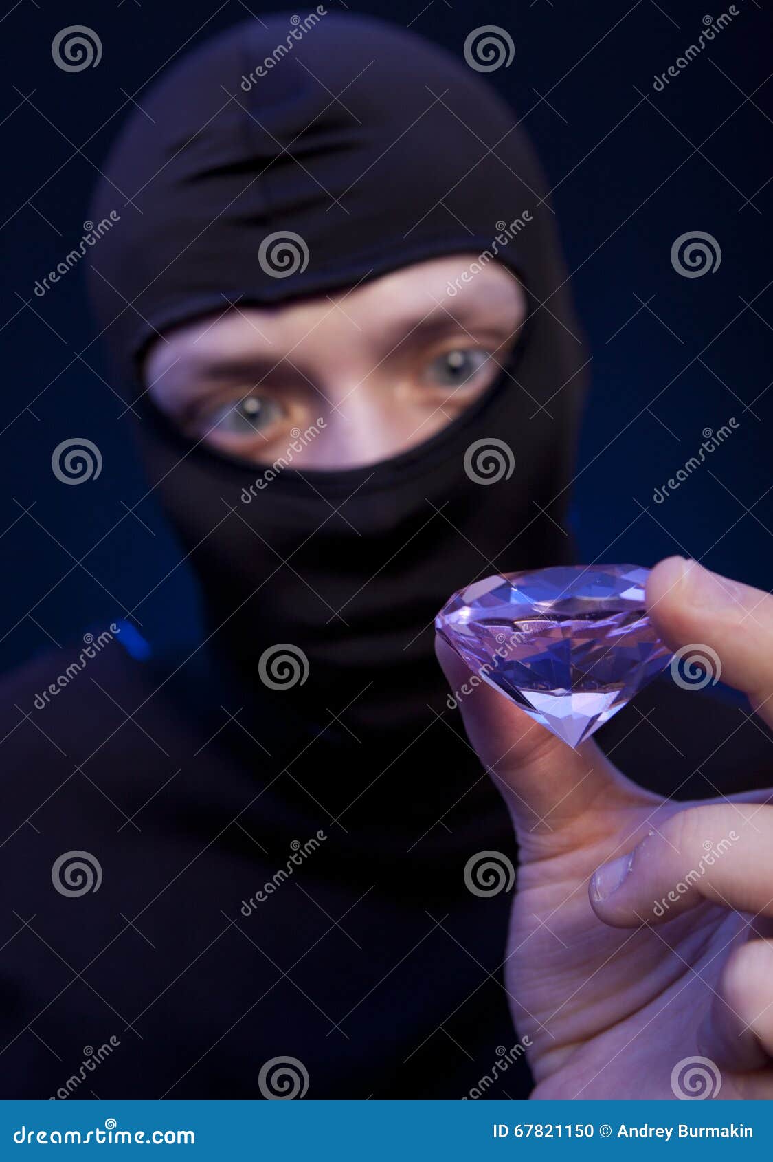 Thief. Man in Black Mask with a Big Emerald Stock Photo - Image of ...