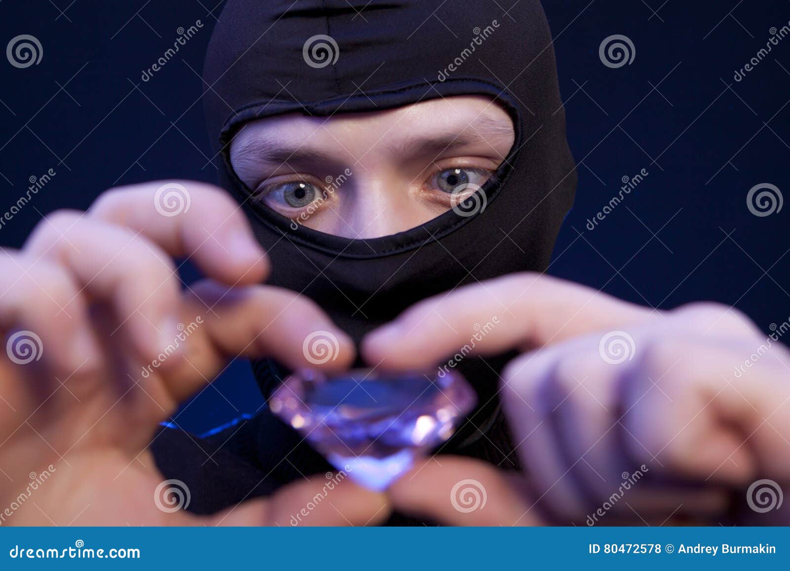 Thief. Man in Black Mask with a Big Emerald Stock Photo - Image of ...