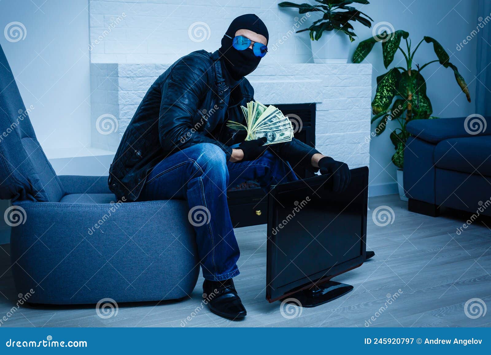 A thief man stole a TV. stock image. Image of convict - 245920797
