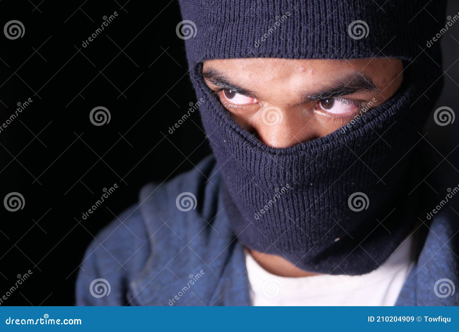 Thief in a Mask on Black Background Close Up, Stock Image - Image of ...