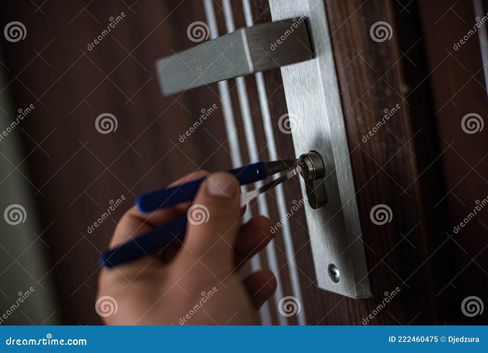 Thief Opening a Lock with Picklock. a Burglar& X27;s Hand with a ...