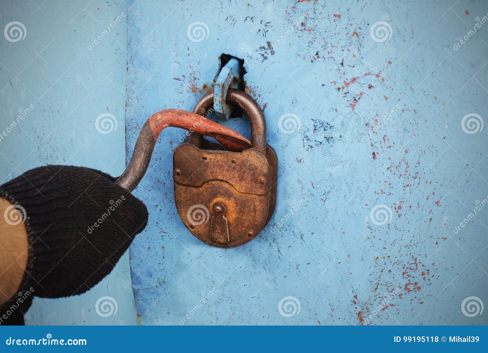 The Thief Opens the Old Lock. Stock Photo - Image of door, rusty: 99195118