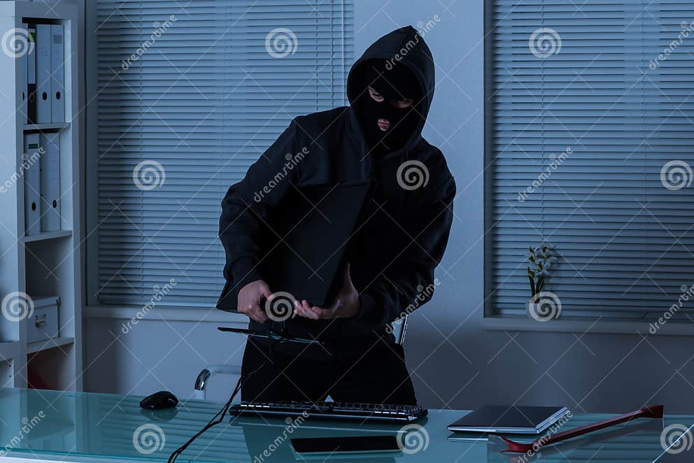 Thief Stealing Computer stock photo. Image of crowbar - 213855584