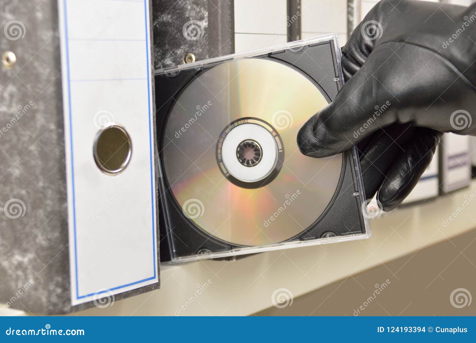 Thief Stealing Documents in Compact Disc Stock Photo - Image of binder ...
