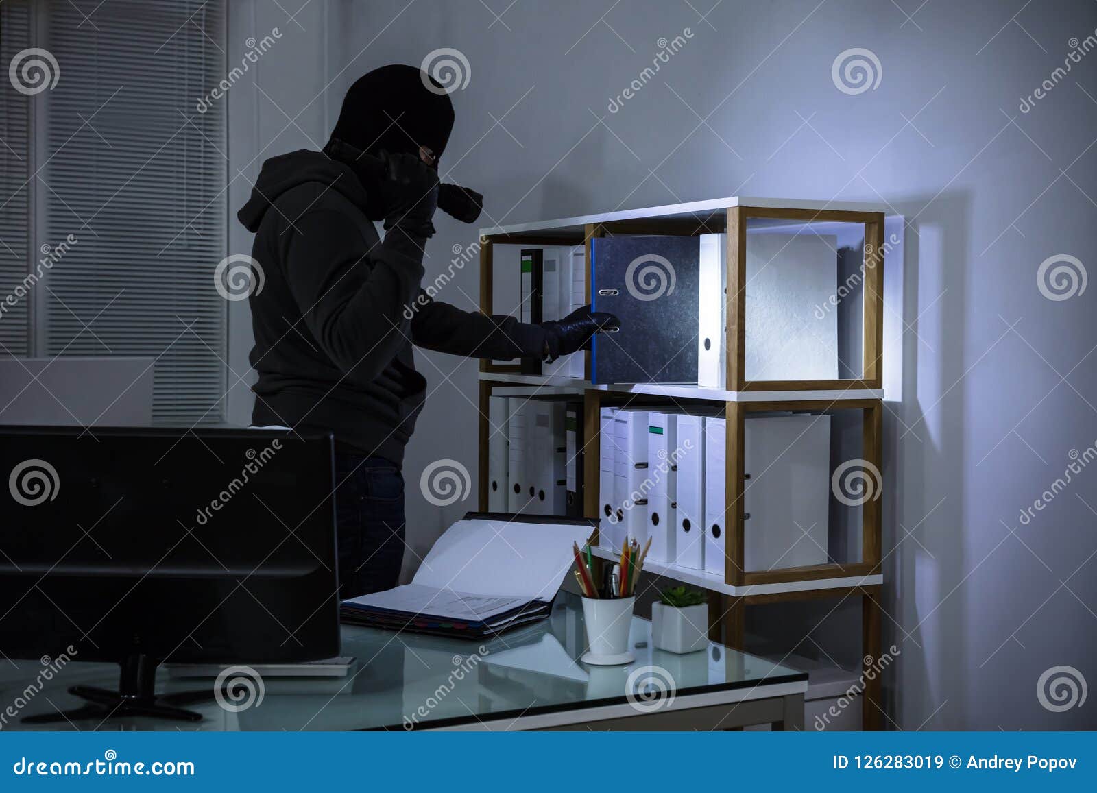 Thief Stealing File from Shelf Stock Image - Image of corporate, male ...