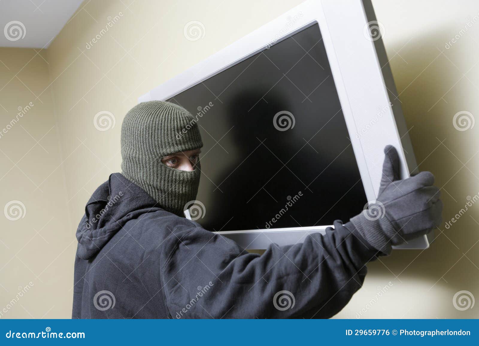 Thief Stealing Flat Screen Television Stock Photo - Image of looking ...