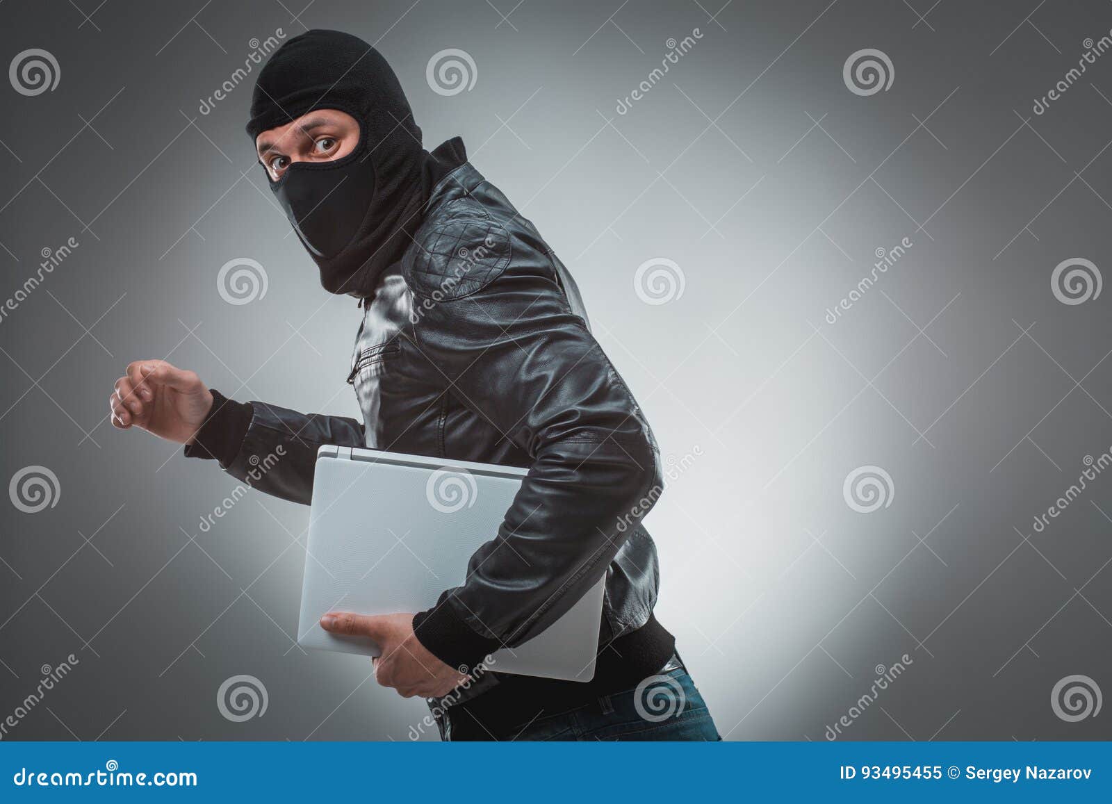 Thief Stealing a Laptop Computer. on Gray Background Stock Image ...