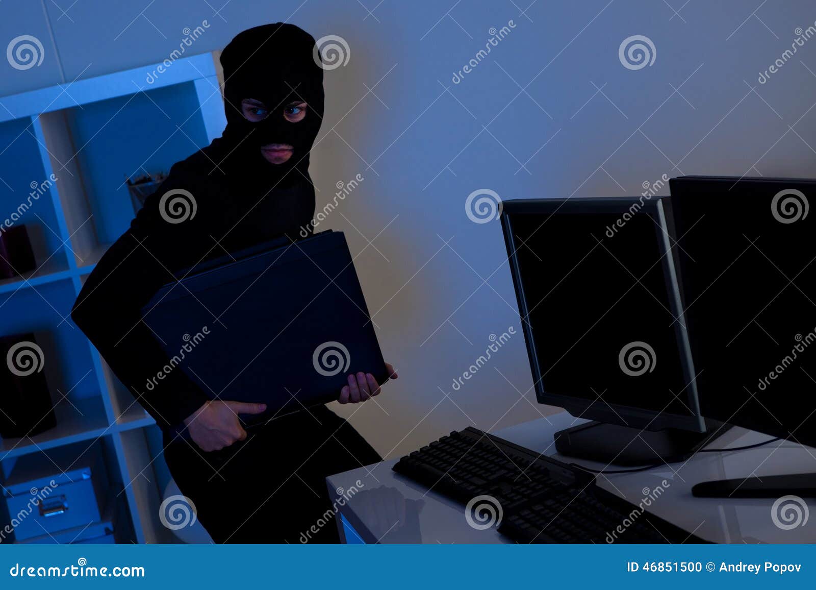 Thief steeling a computer stock photo. Image of danger - 46851500