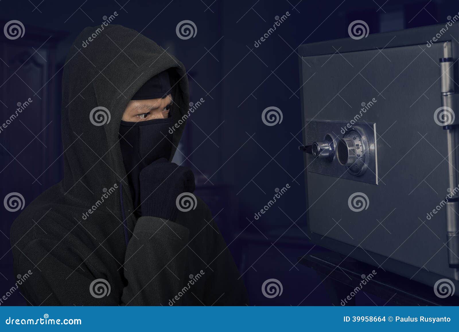 A Thief Thinking the Lock Code Stock Photo - Image of burglary, finance ...