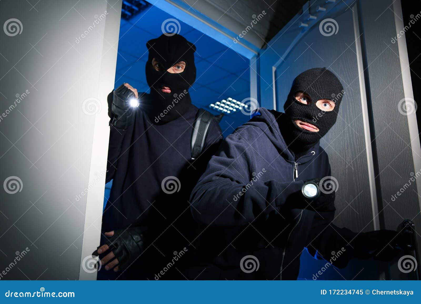 Thieves with Flashlights Breaking into House Stock Image - Image of ...