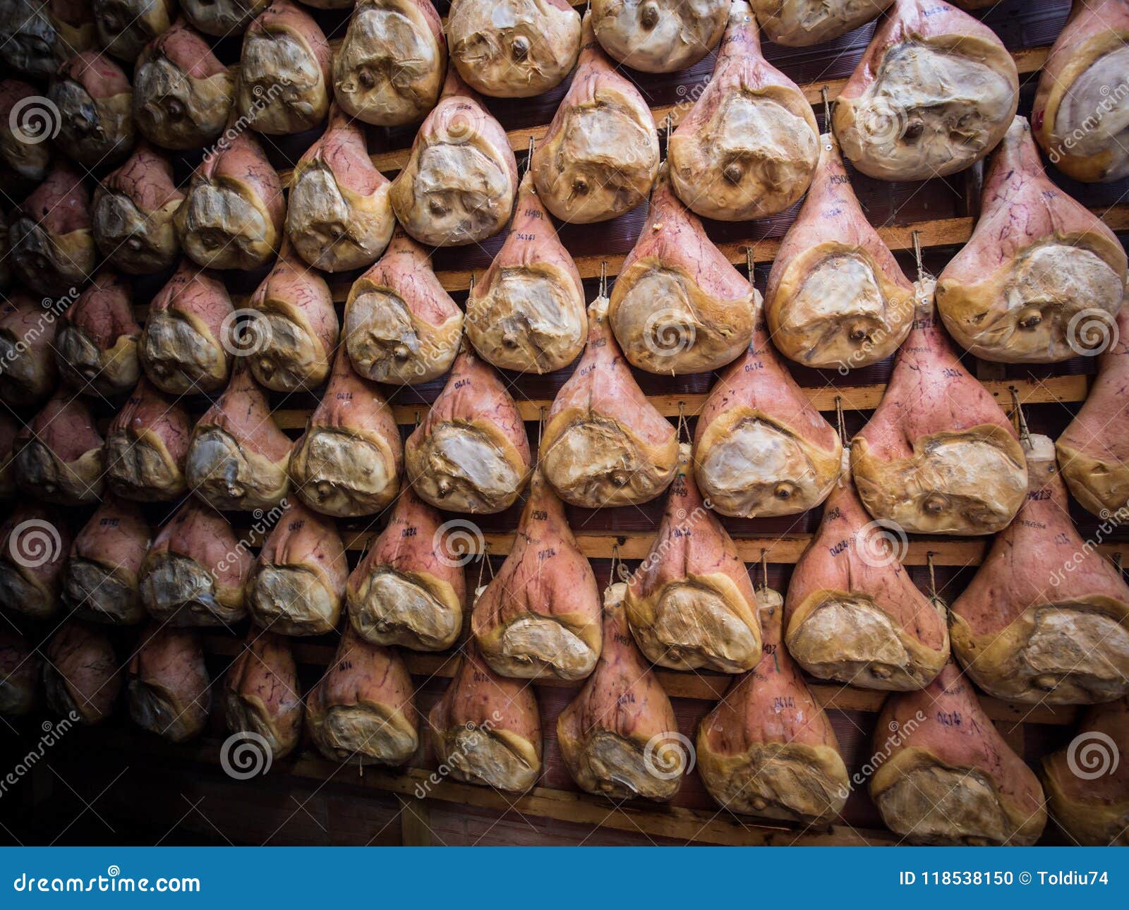 Thighs of Ham during the Seasoning Process Hanging in a Cellar. Stock ...