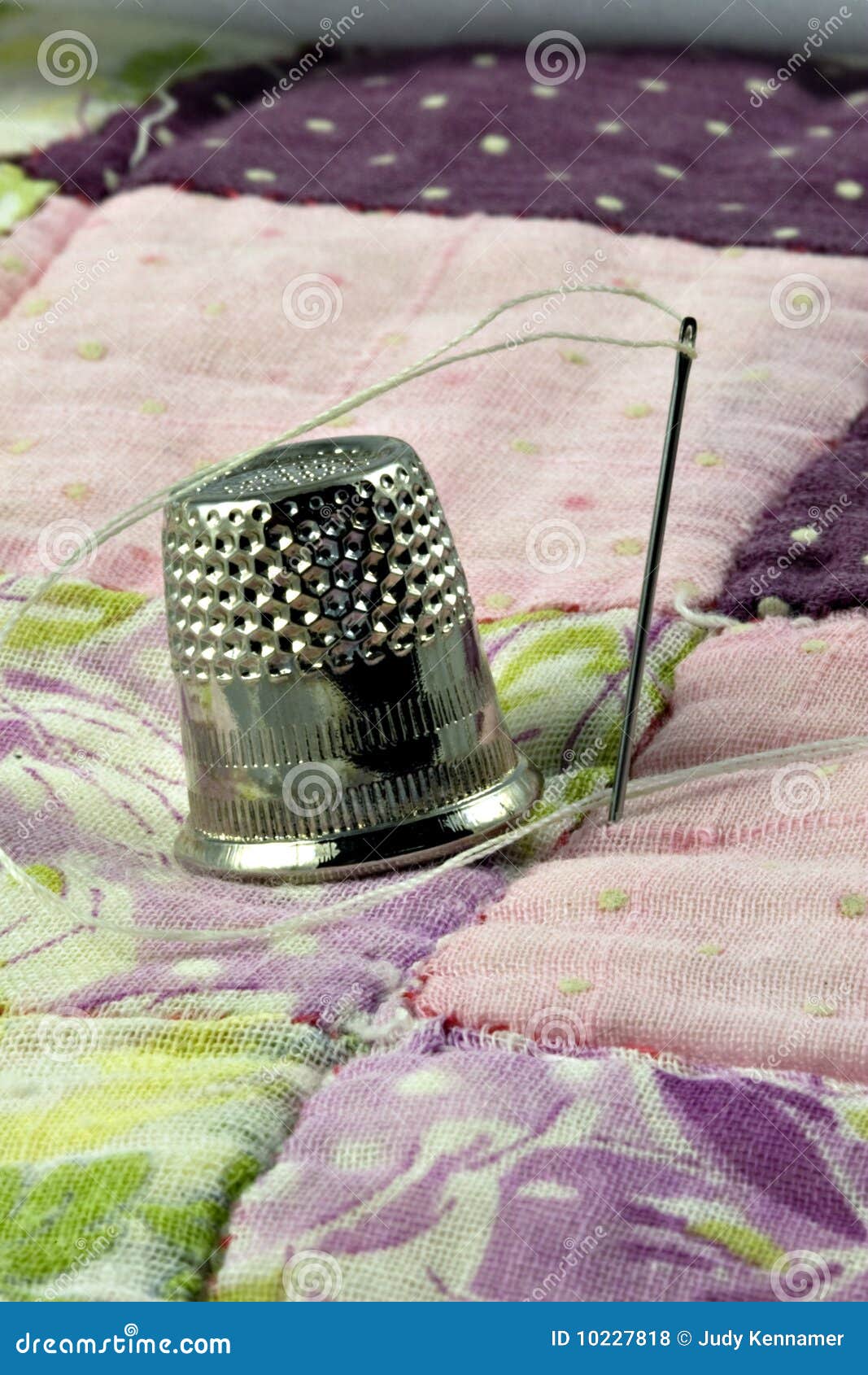 Thimble and Patchwork Quilt Stock Photo - Image of green, folksy: 10227818