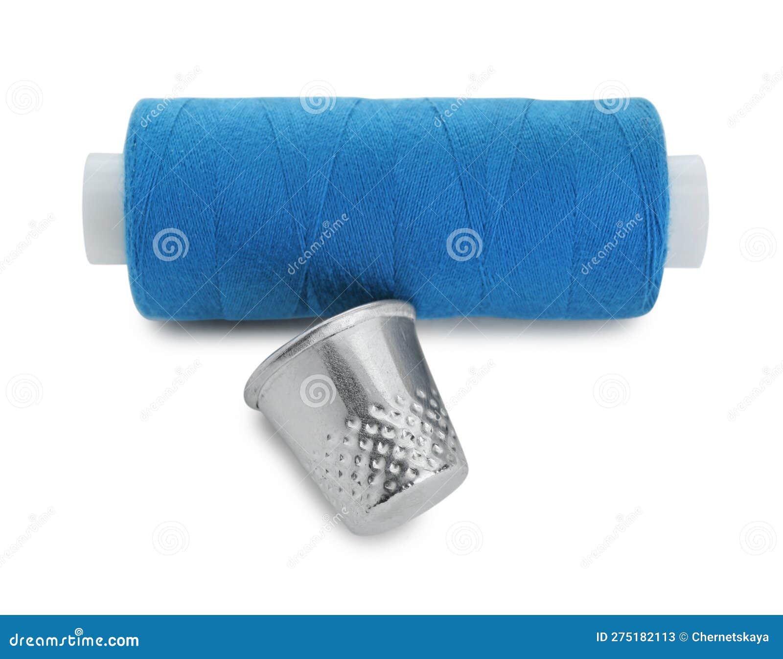 Thimble and Spool of Blue Sewing Thread Isolated on White, Above View ...