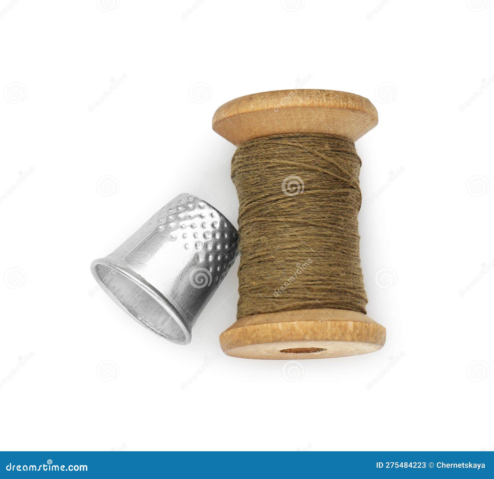 Thimble and Spool of Brown Sewing Thread Isolated on White, Top View ...
