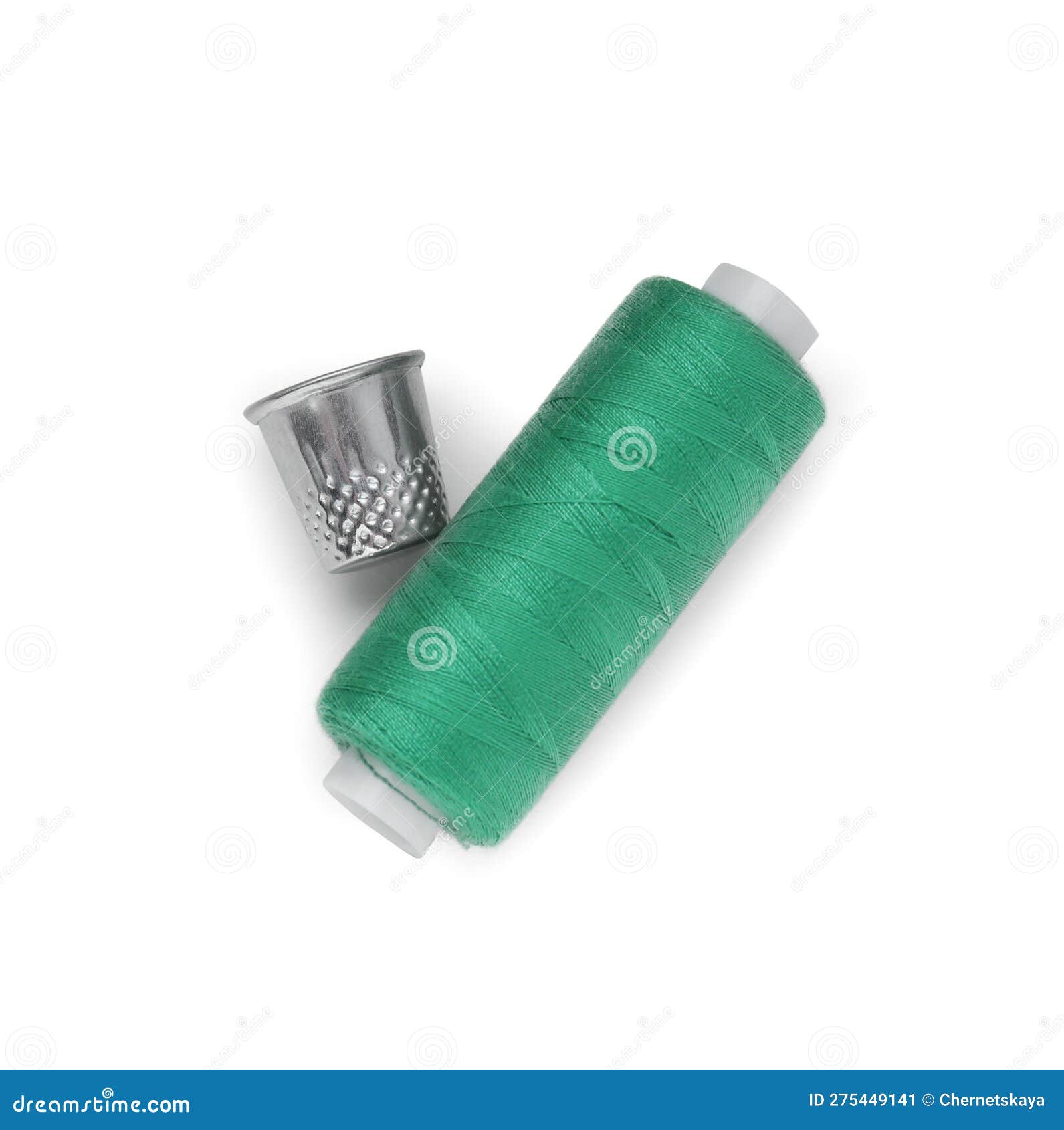 Thimble and Spool of Green Sewing Thread Isolated on White, Top View ...