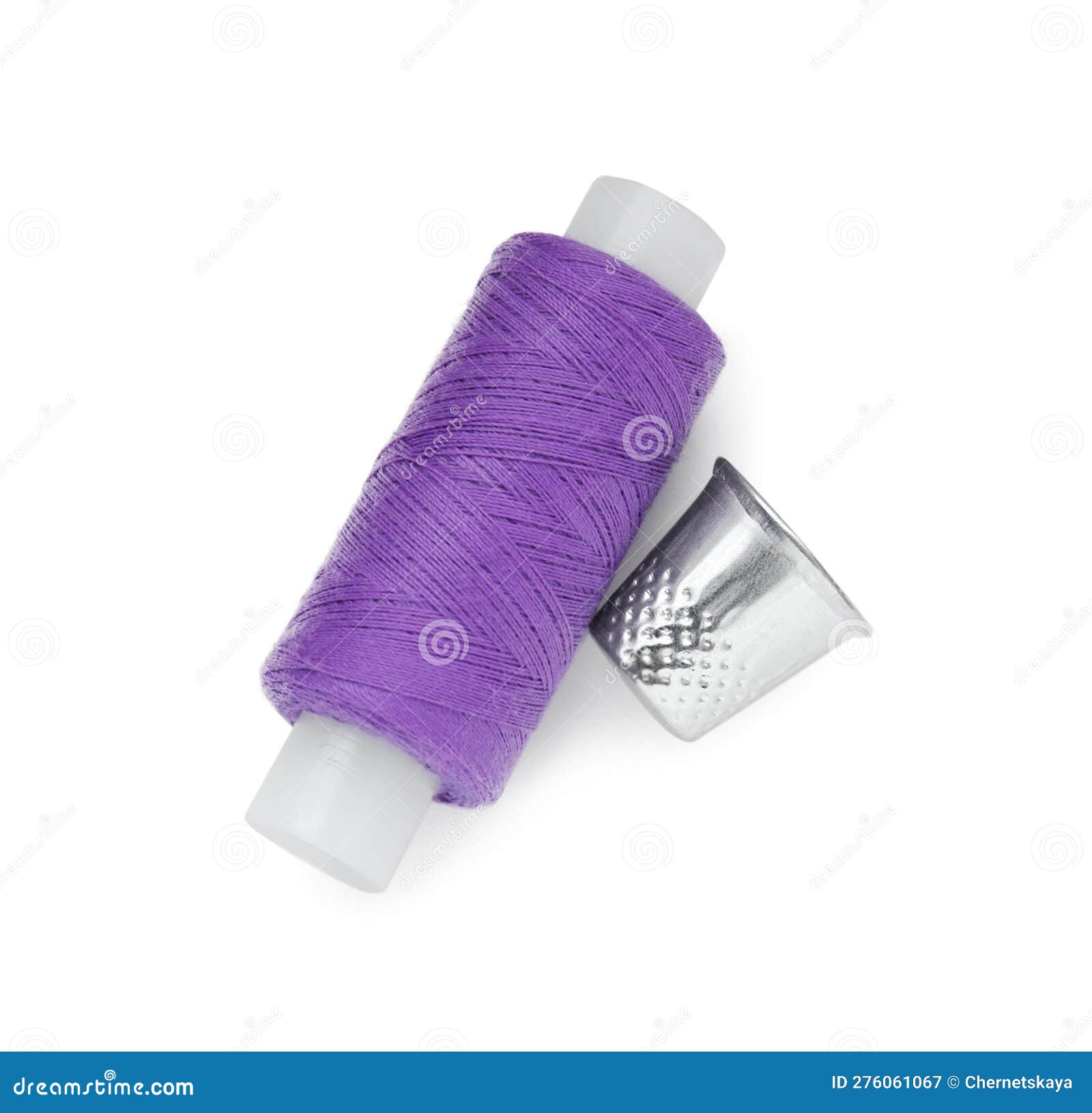 Thimble and Spool of Purple Sewing Thread Isolated on White, Top View ...