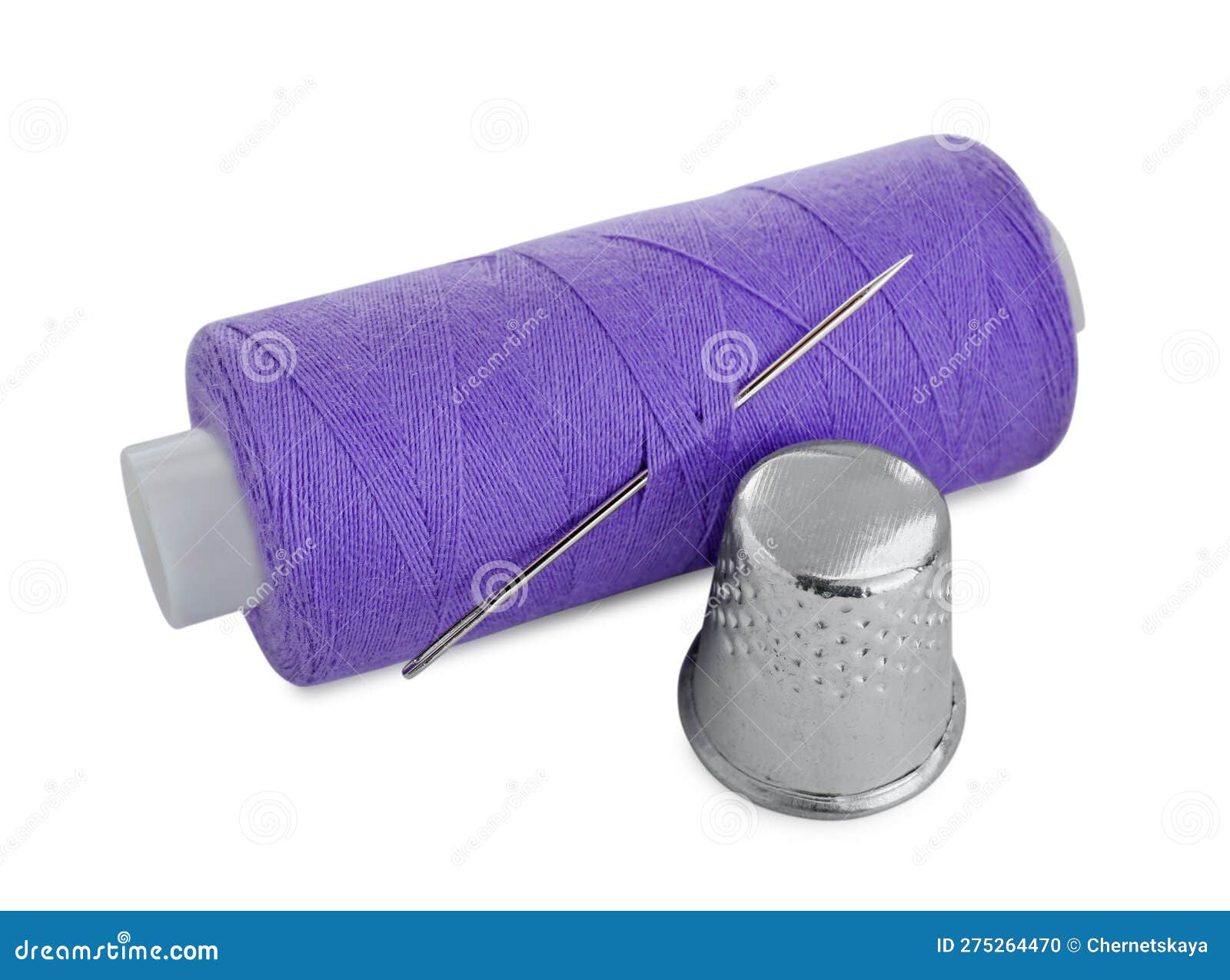 Thimble and Spool of Purple Sewing Thread with Needle Isolated on White ...