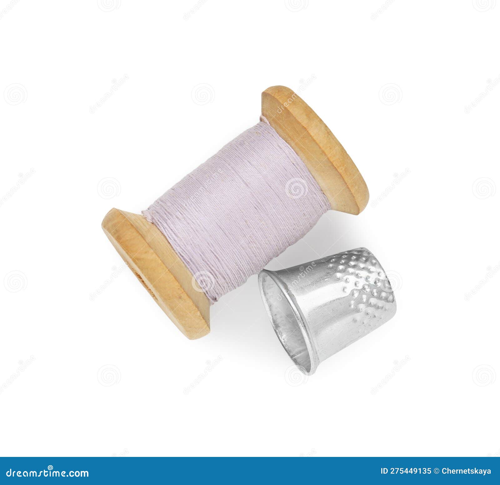 Thimble and Spool of Violet Sewing Thread Isolated on White, Top View ...