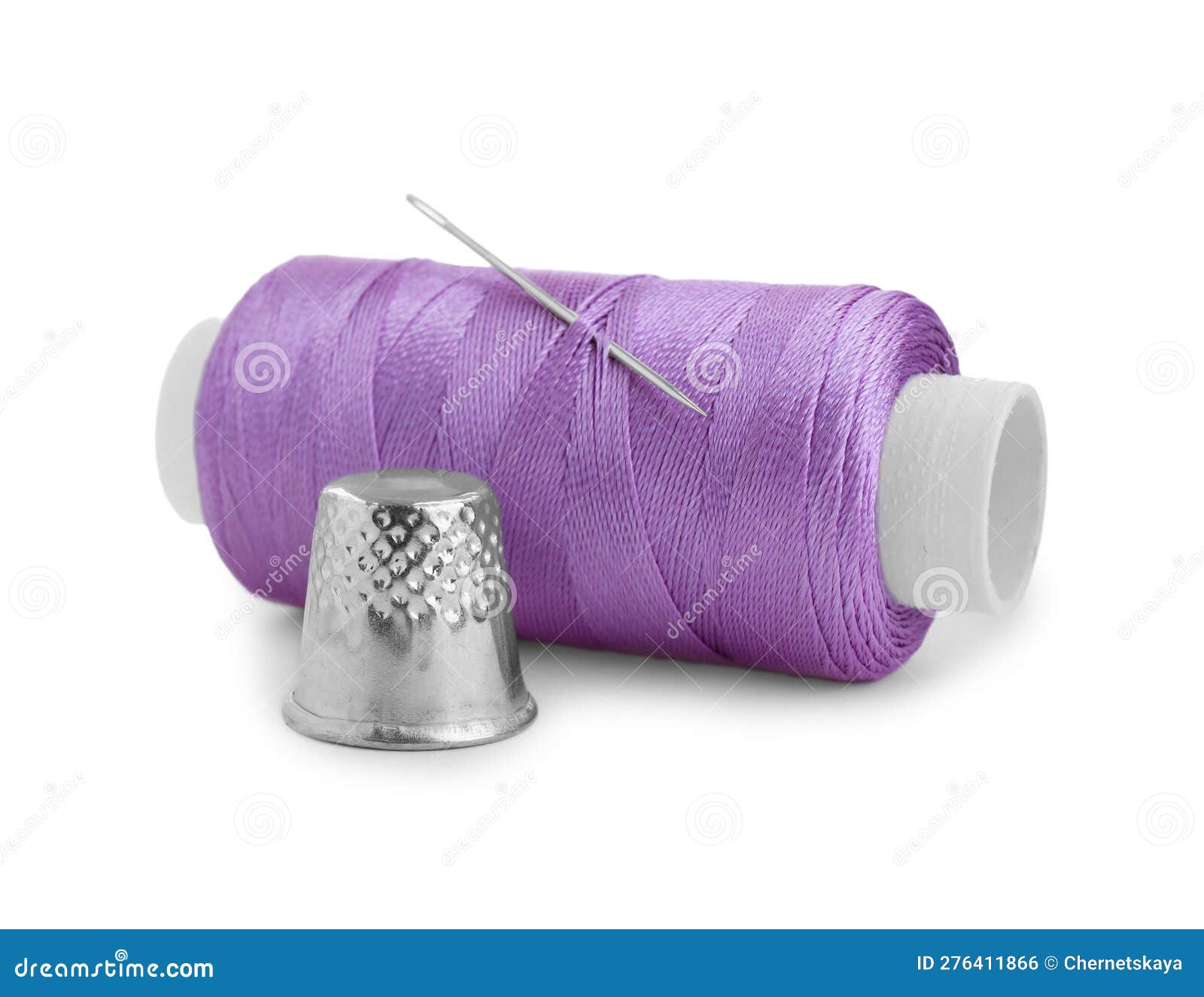 Thimble and Spool of Violet Sewing Thread with Needle Isolated on White ...