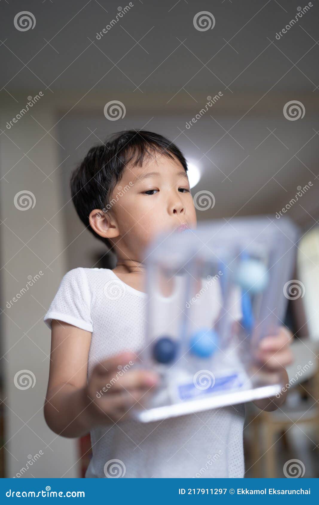 Thin Boy Uses a Tri-ball Incentive Spirometer for Check His Lung ...