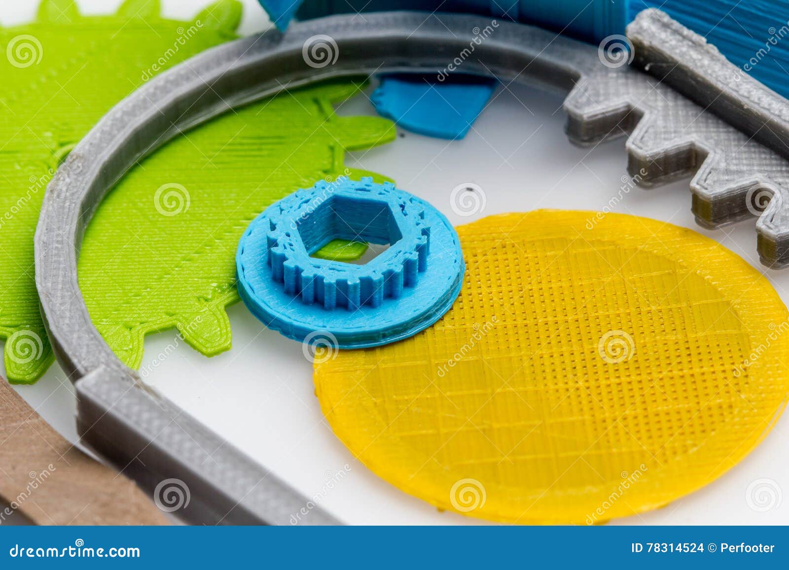 Thin Green 3D Printed Gear with Visible Layers of Plastic that is ...