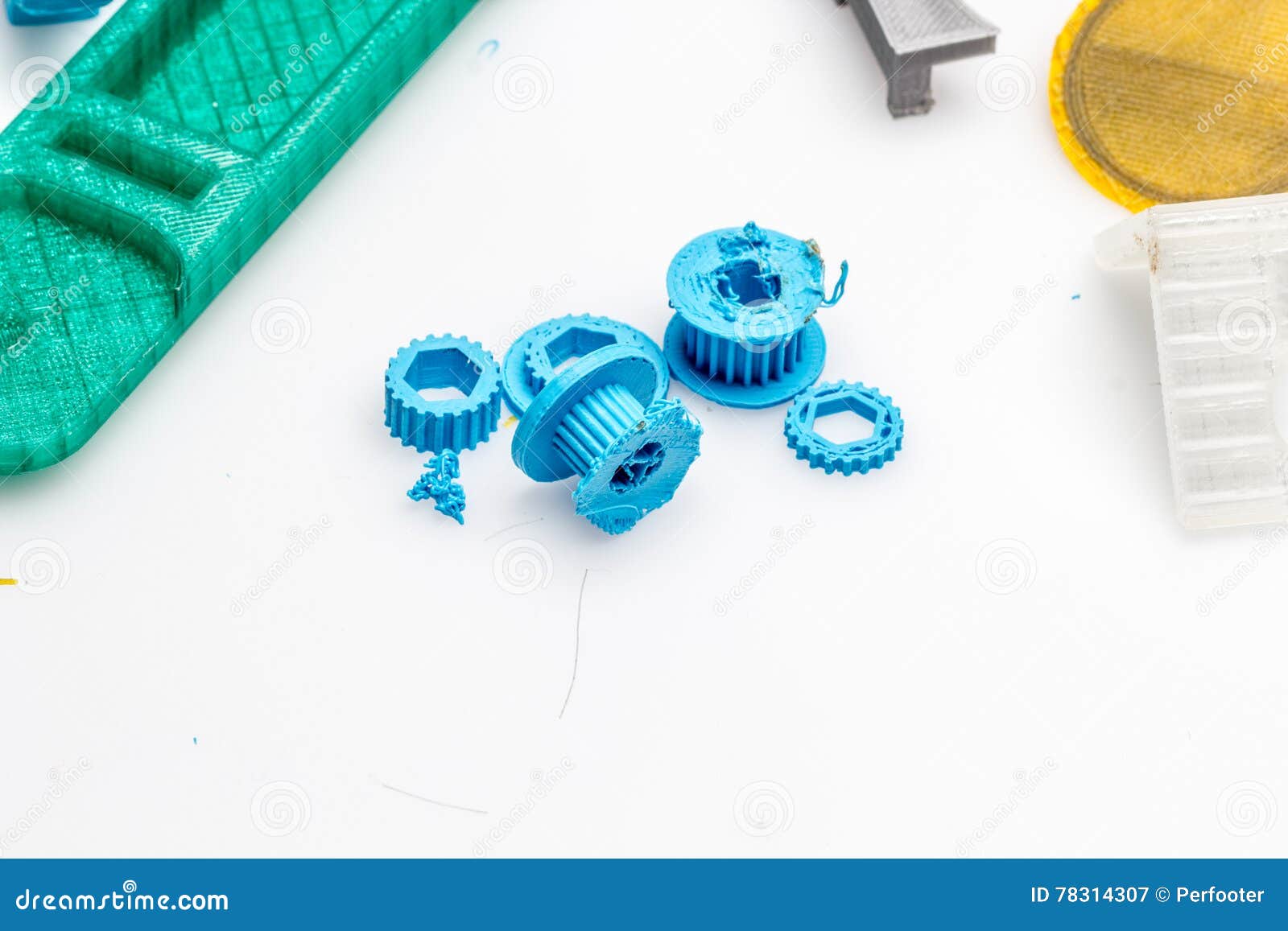 Thin Green 3D Printed Gears with between Other Objects Made in Plastic ...