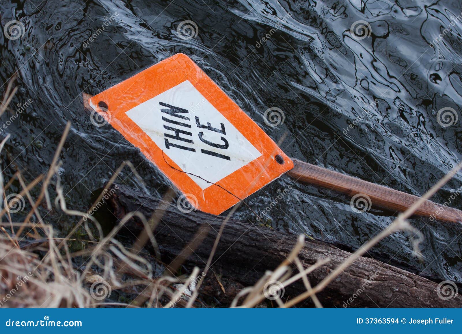 Thin Ice sign in water stock photo. Image of texture - 37363594