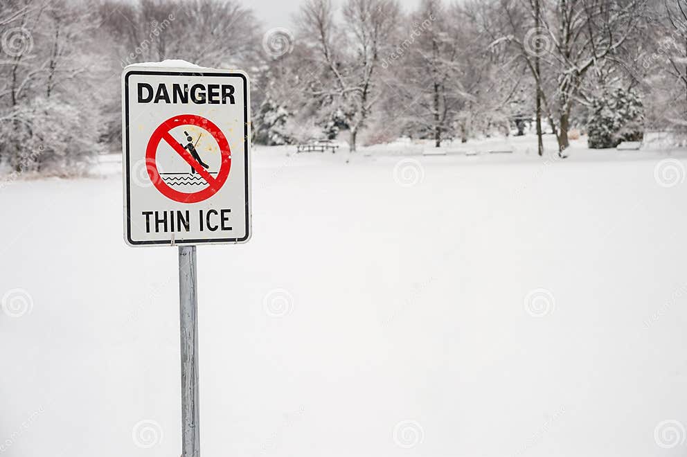 Thin Ice Warning Sign stock photo. Image of snow, thin - 83676554