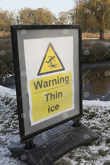 Warning sign of thin ice stock image. Image of danger - 263997069